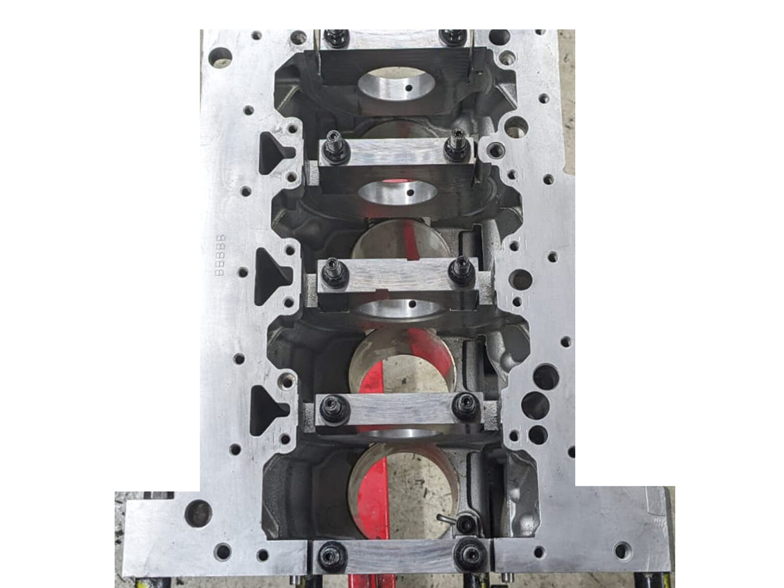 Machine caps to deck of block